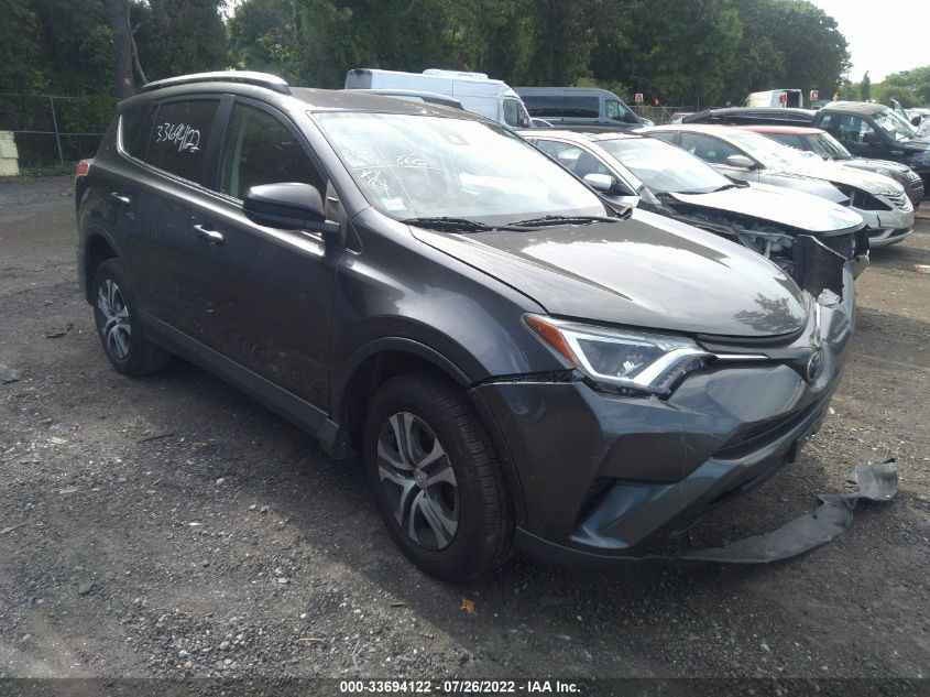 2018 Toyota RAV4 | VIN: JTMBFREV9JJ221849 | America Motors